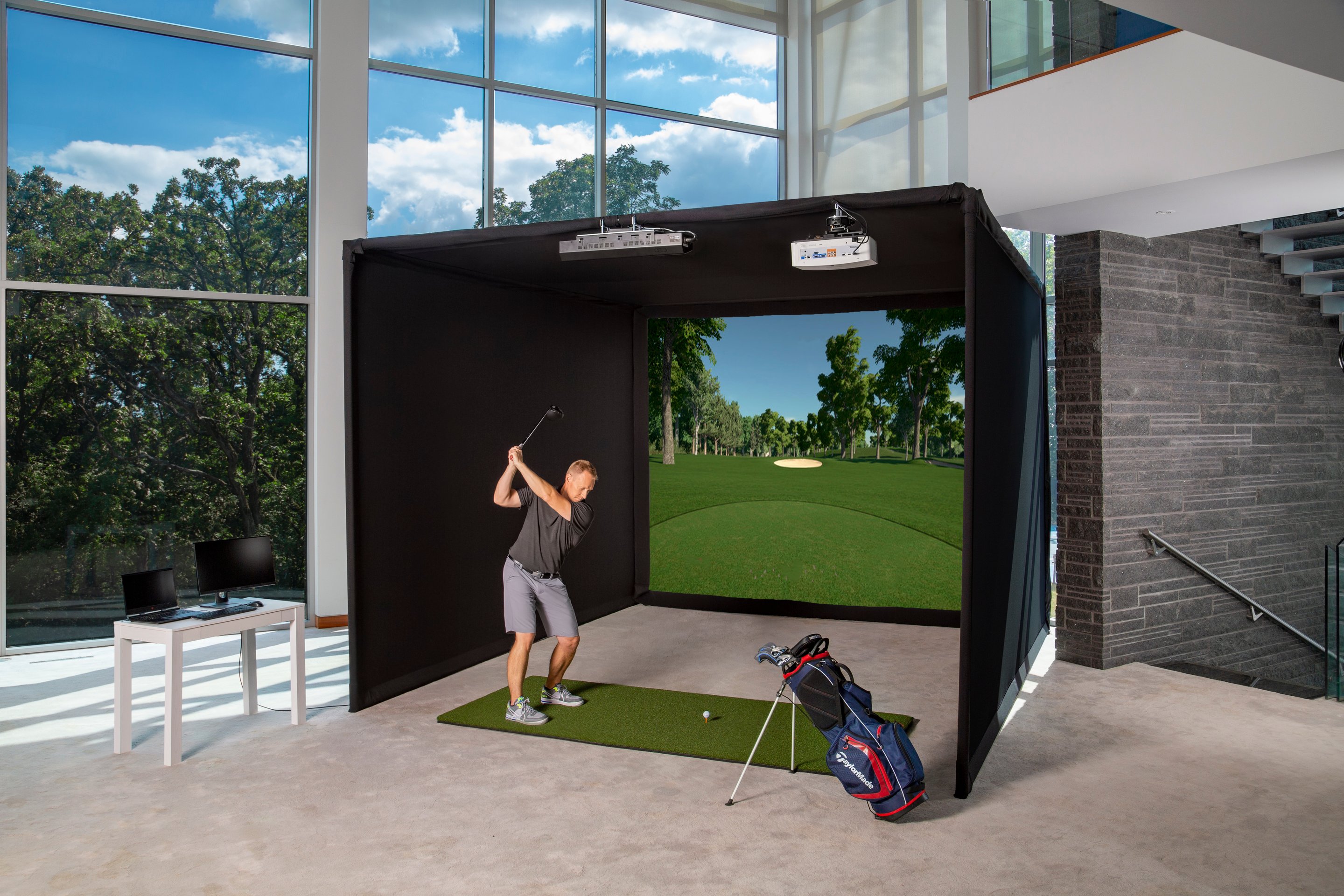 The Hidden Benefits Of Having A Golf Simulator At Work - Carl's Place